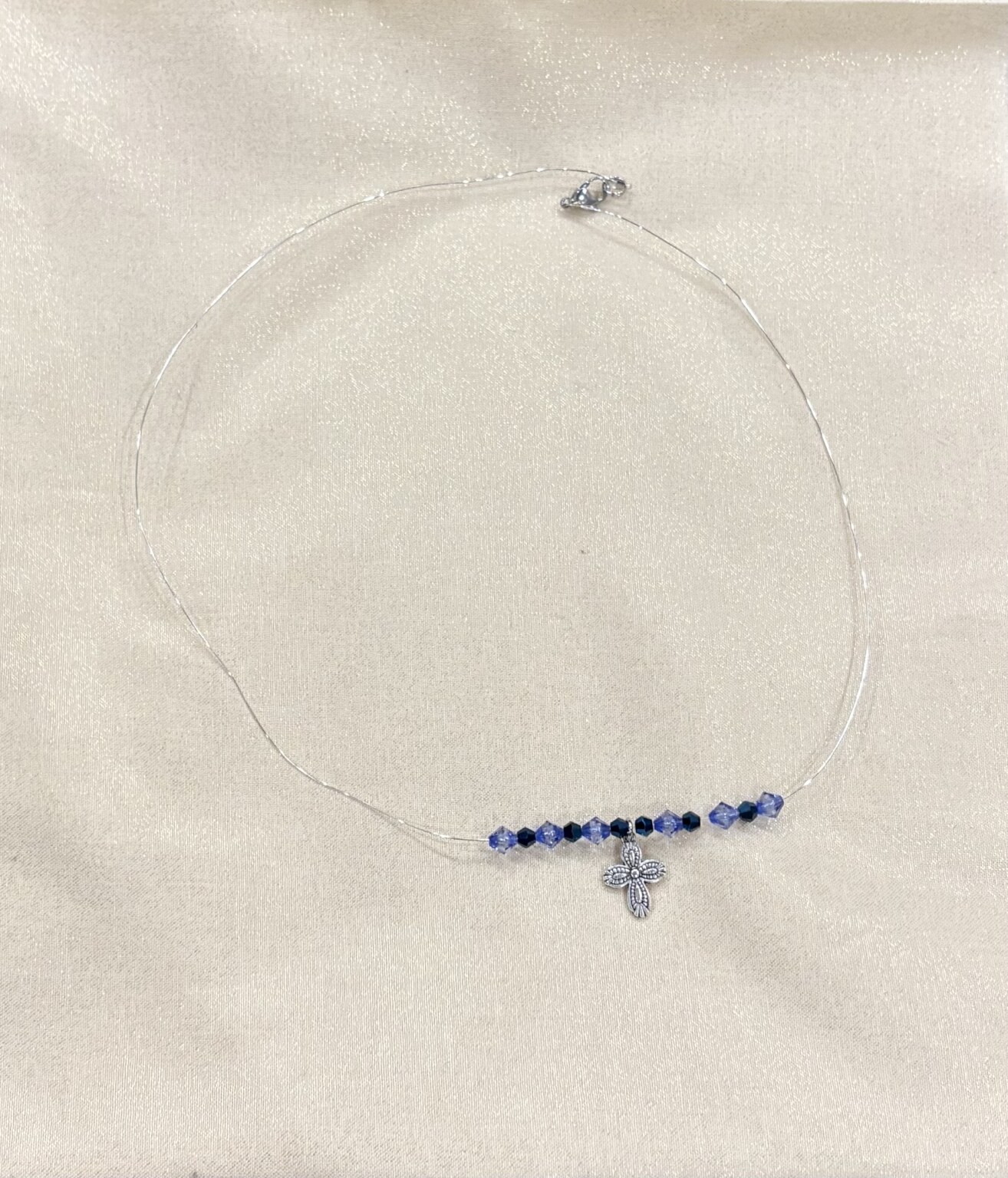 Blue cross necklace | Peter’s Square